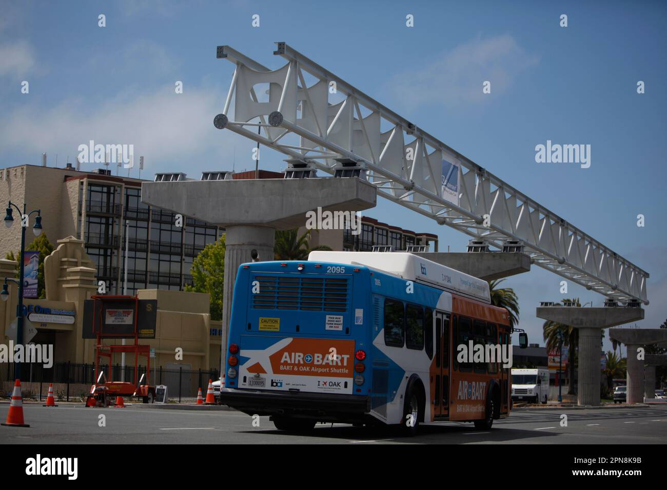 An AirBART bus passes the newly installed steel trestle for the Oakland ...