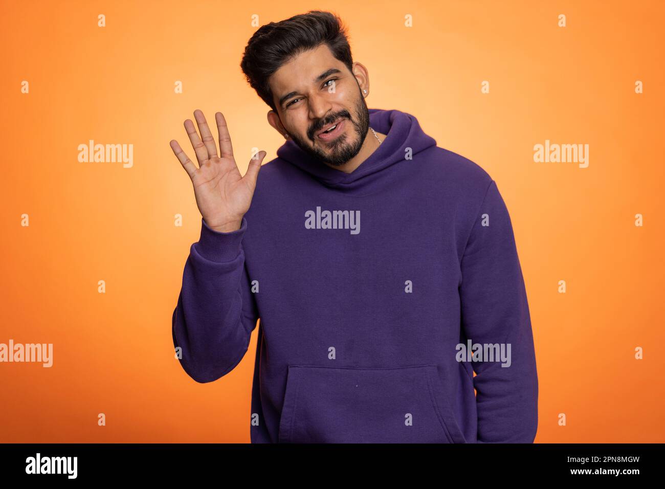 Hello. Come here, join us. Welcome. Hindu bearded man showing inviting ...