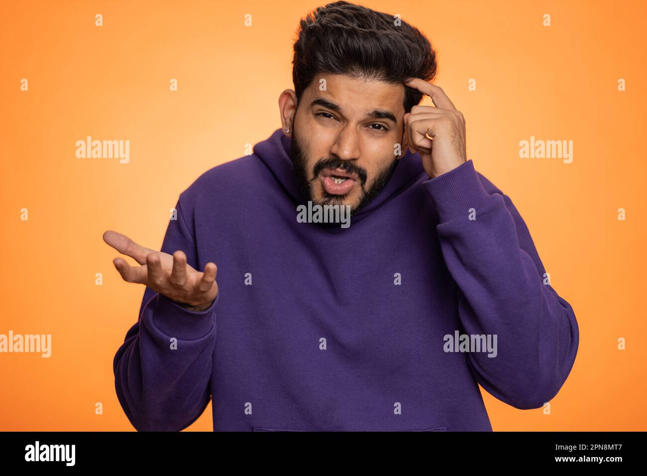 No idea, I dont know answer. Puzzled clueless uncertain indian handsome ...