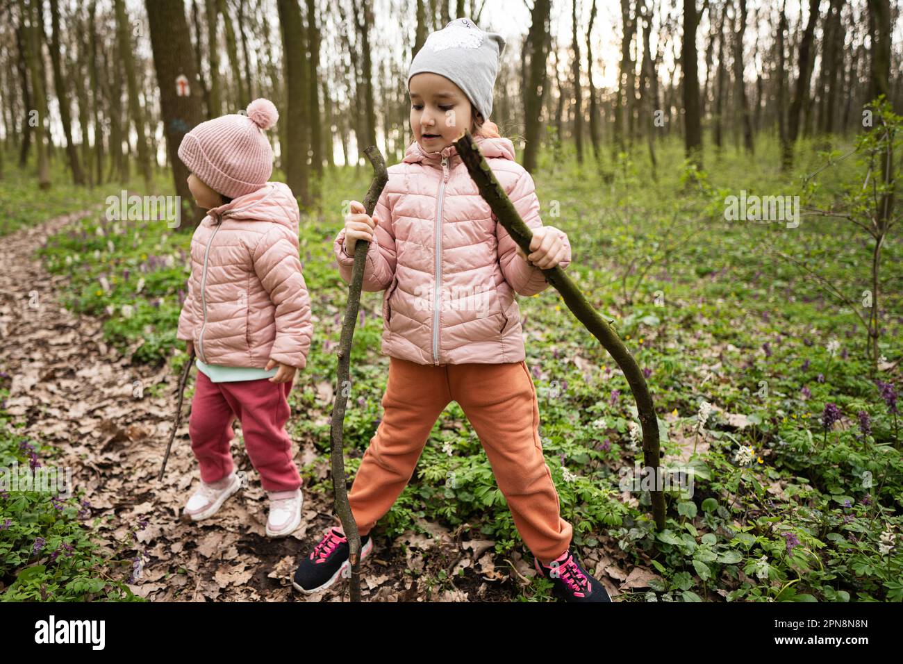 Children playing sticks outdoors hi-res stock photography and images ...