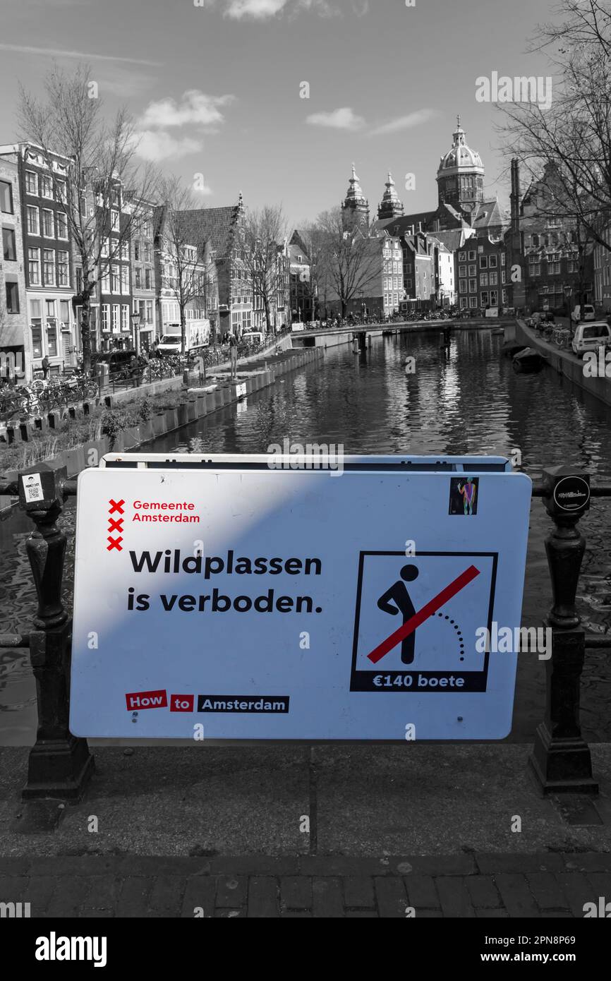 No public peeing It's illegal sign in Dutch on bridge over canal at ...