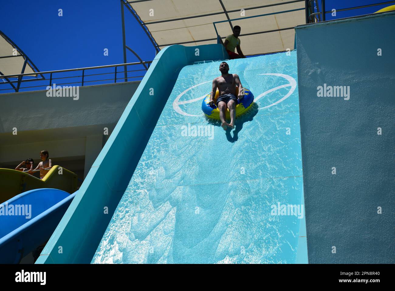 People sliding in the slide pool at the hotel Stock Photo - Alamy