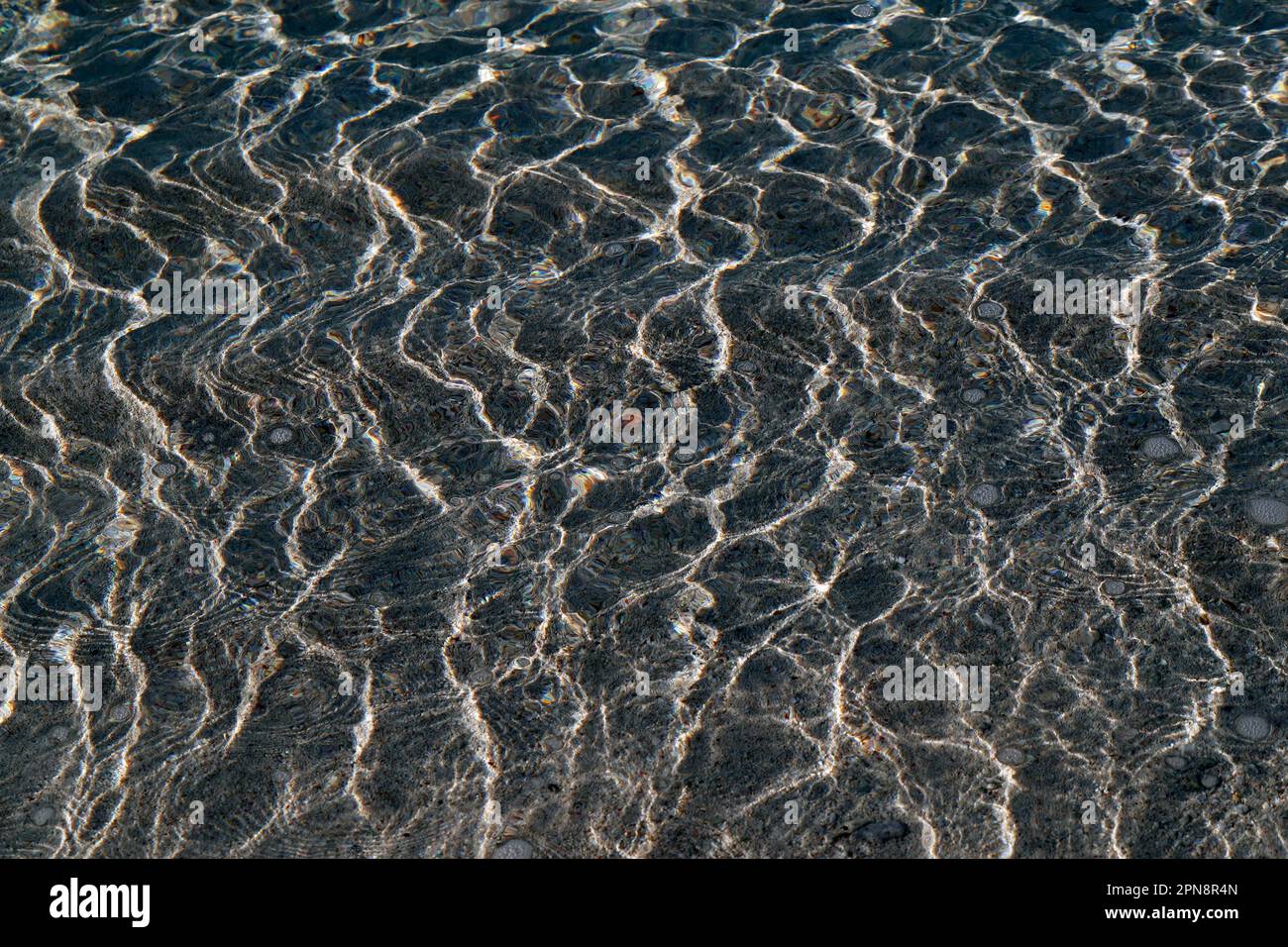 The texture of the sea water is photographed close-up. Cayman Islands ...