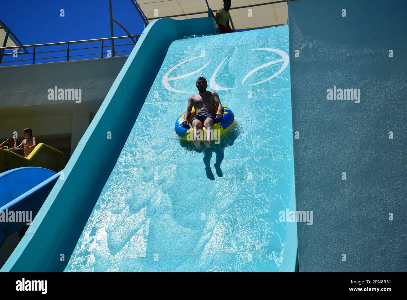 People sliding in the slide pool at the hotel Stock Photo - Alamy