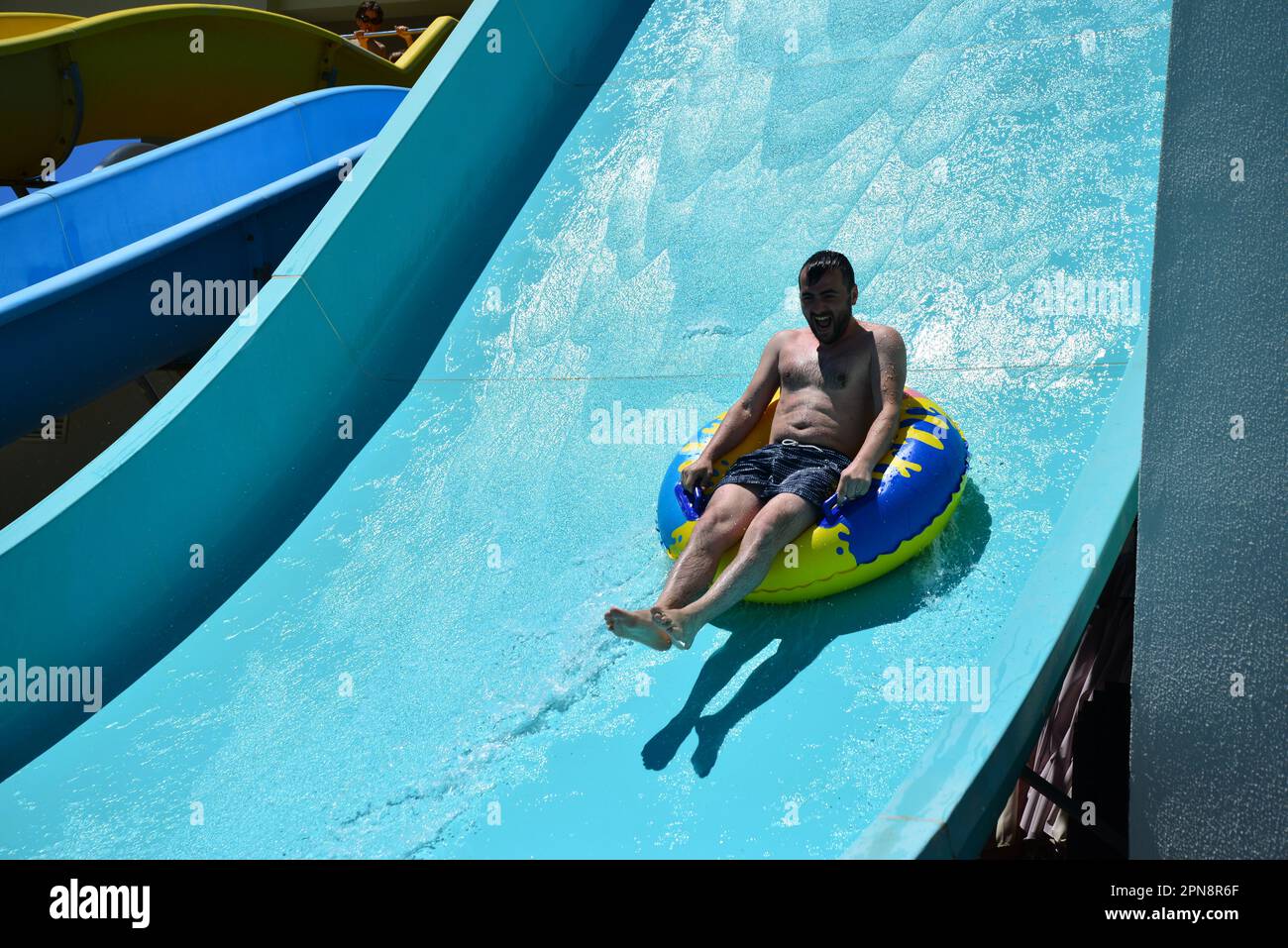 People sliding in the slide pool at the hotel Stock Photo - Alamy