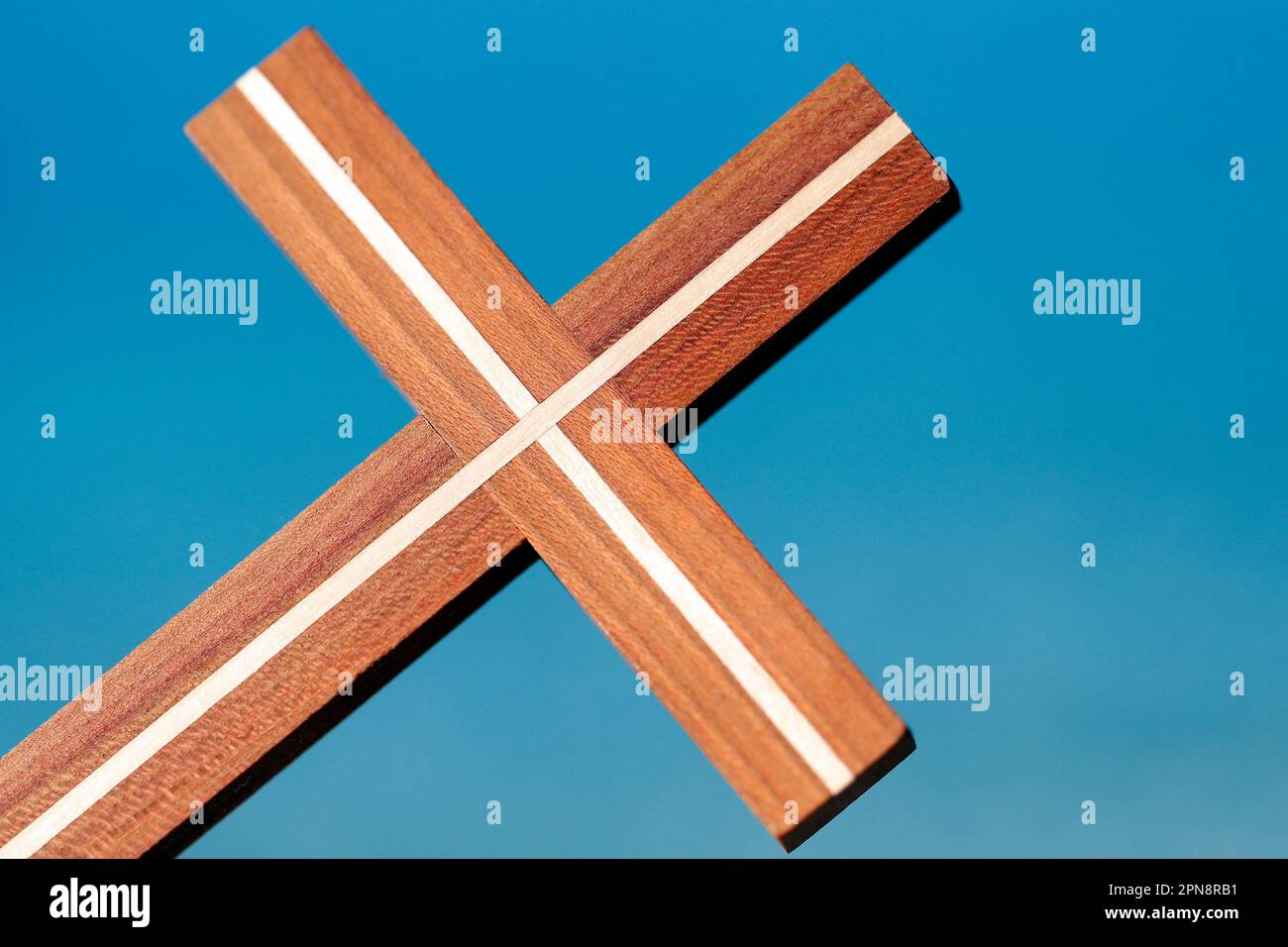 Cross against blue sky hi-res stock photography and images - Alamy