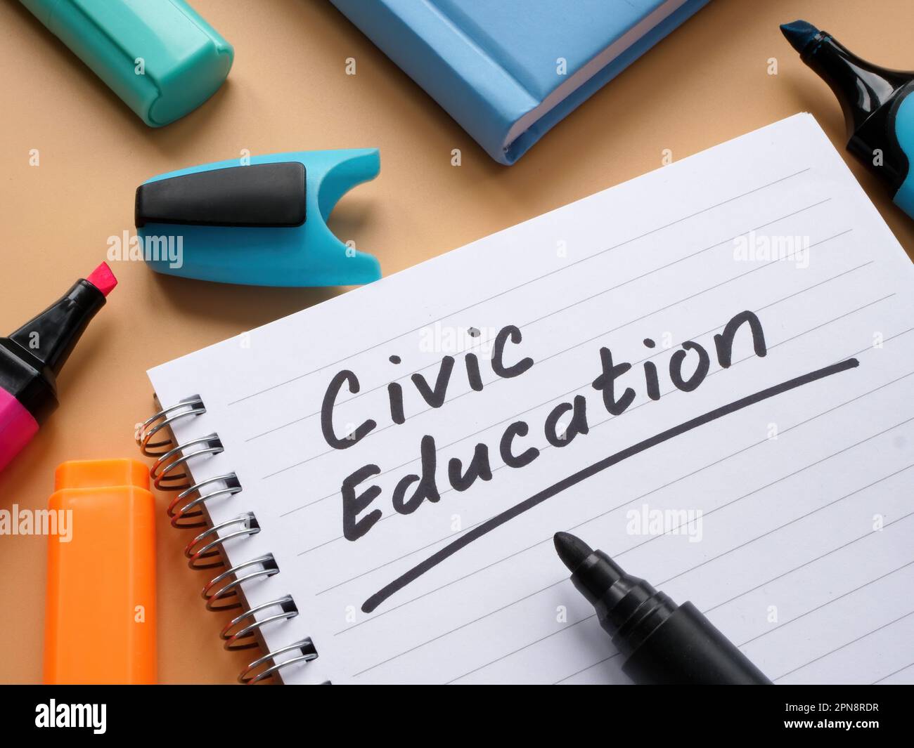 Open notebook with words civic education and marker Stock Photo - Alamy