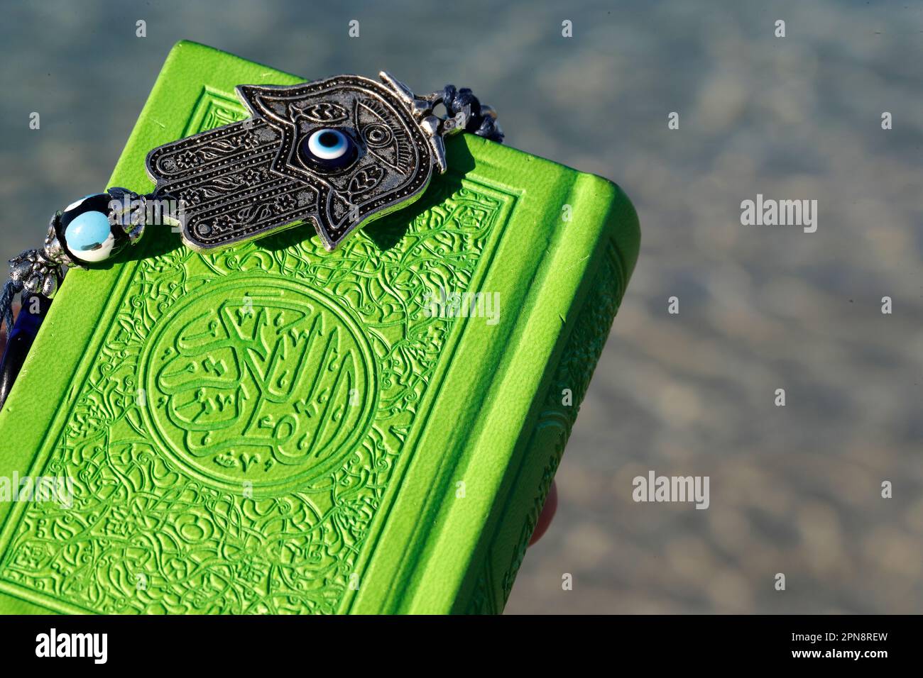 Green Holy Quran and Hamsa, Eye of Fatima, Hand of Fatima amulets to ...