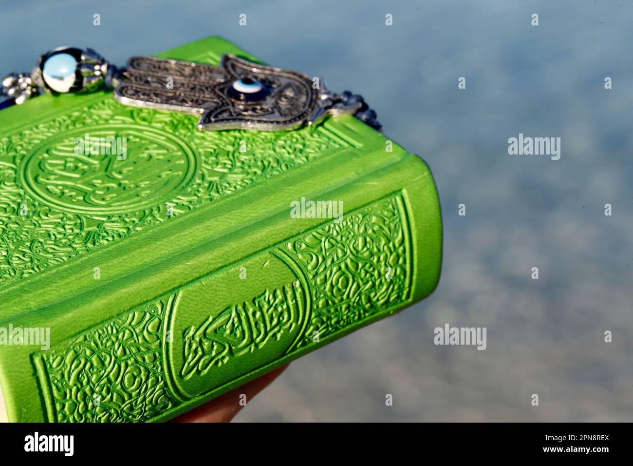 Green Holy Quran and Hamsa, Eye of Fatima, Hand of Fatima amulets to ...