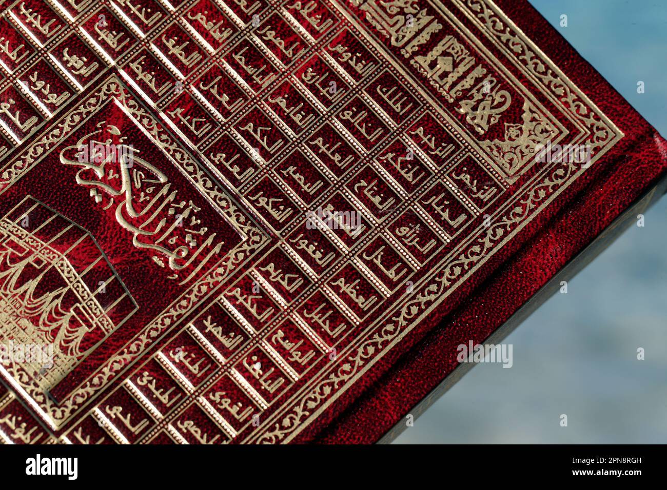 The cover of the Holy Quran (Koran) with the 99 names of Allah in ...