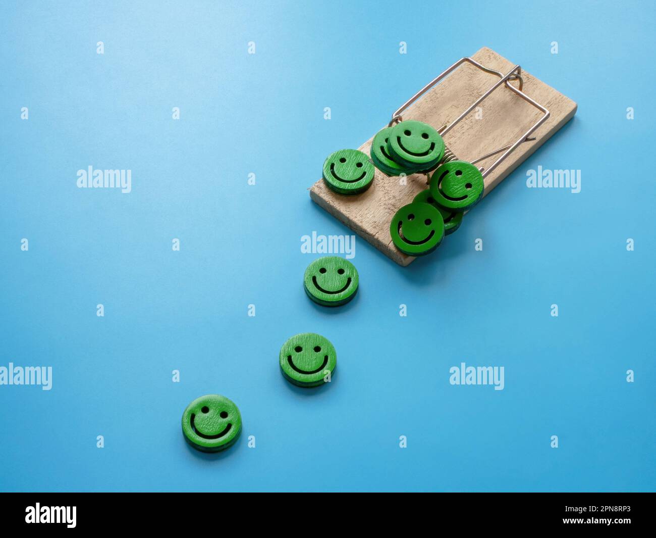 Smileys at the trap. Dopamine addiction concept Stock Photo - Alamy