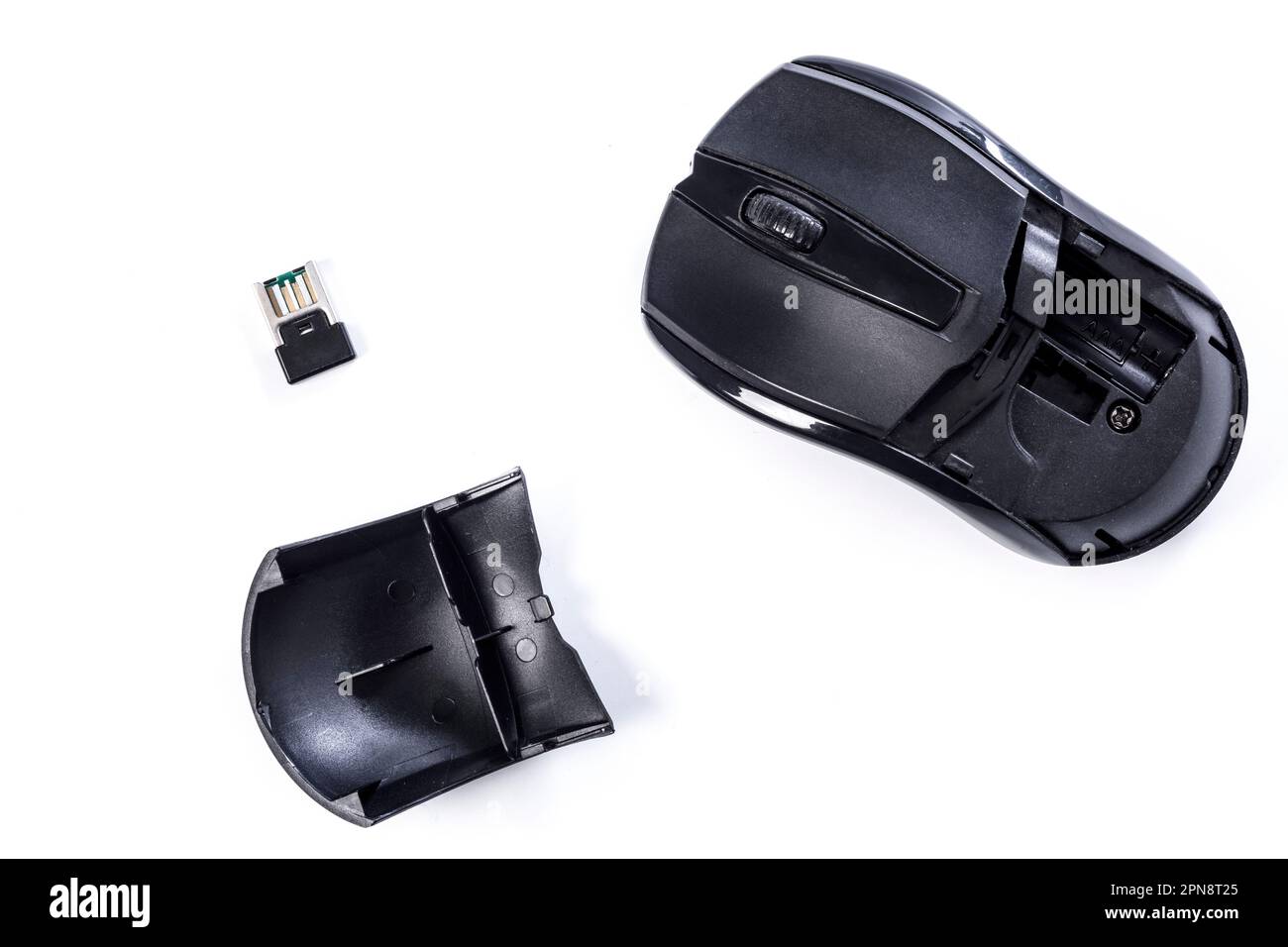 Black wireless mouse taken apart on white. Top view Stock Photo - Alamy