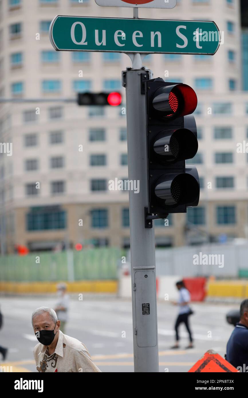 Red stop light at junction of Queen street. Singapore Stock Photo - Alamy