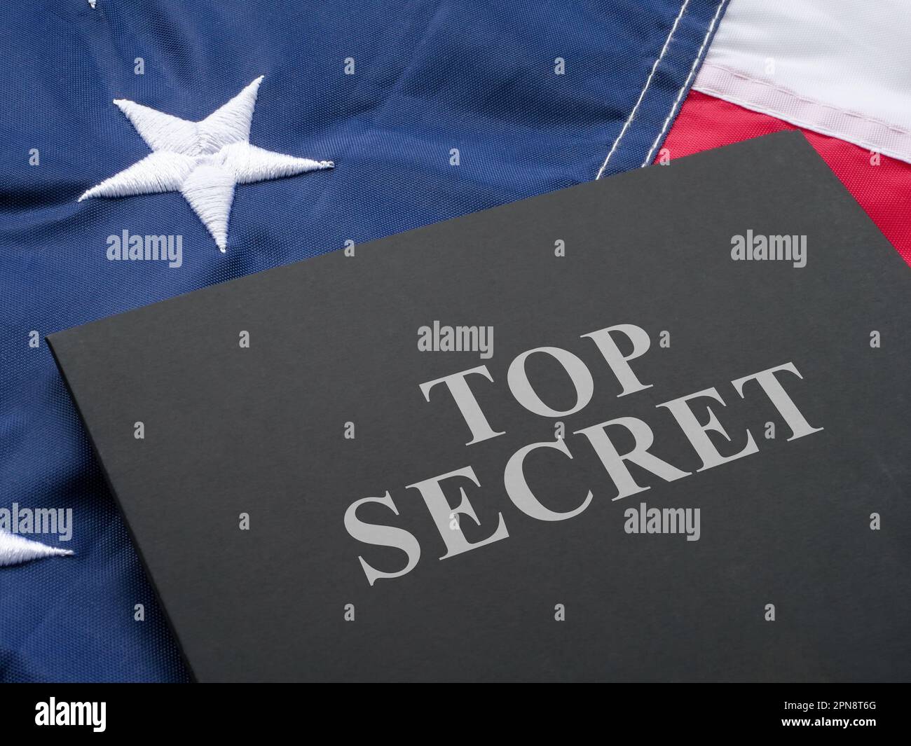 US flag and a folder labeled Top Secret Stock Photo - Alamy