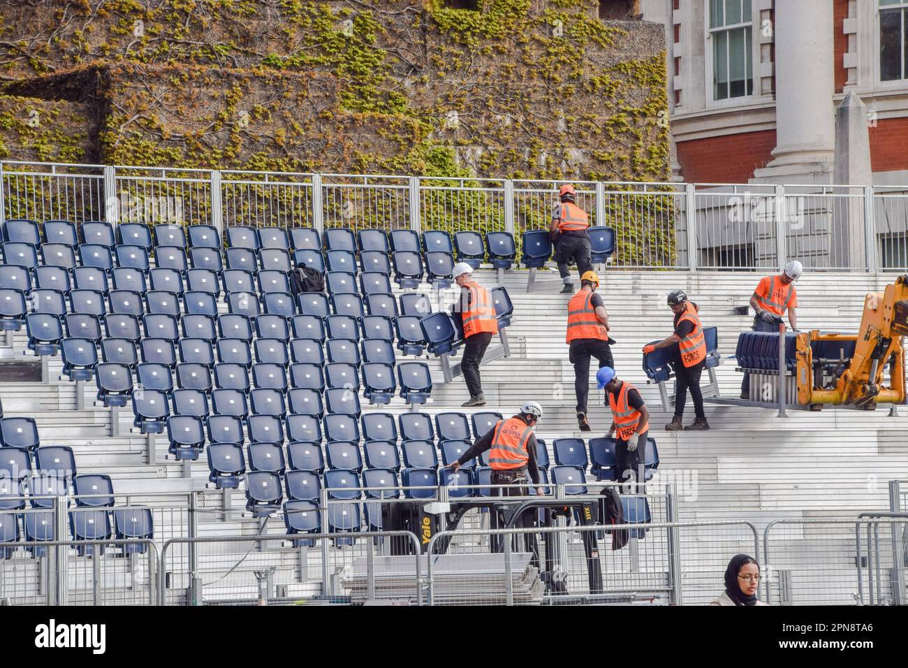 London, UK. 17th Apr, 2023. Workers install seats at Horse Guards ...