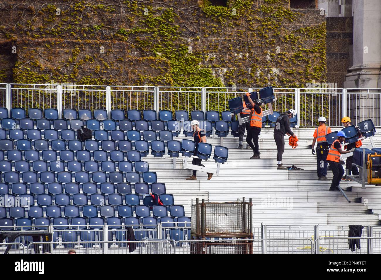 London, UK. 17th Apr, 2023. Workers install seats at Horse Guards ...