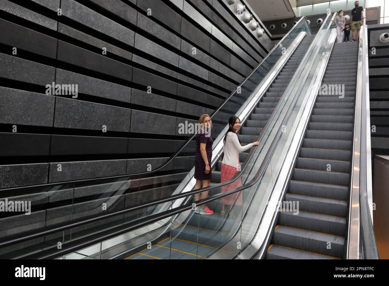 Singapore escalators hi-res stock photography and images - Alamy