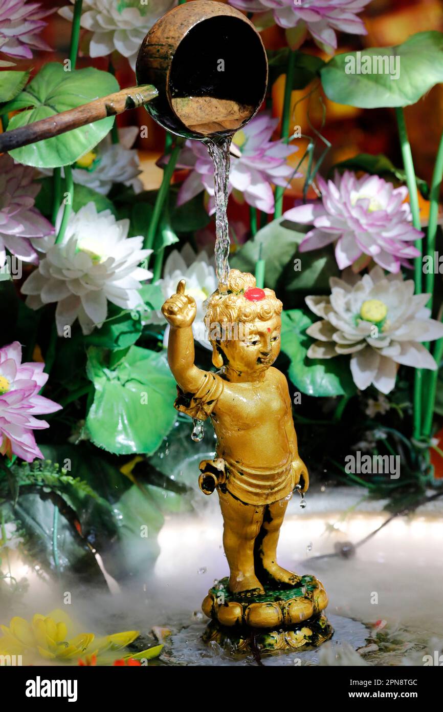 Vesak celebration. Birthday of Shakyamuni Buddha. Bathing infant Buddha ...