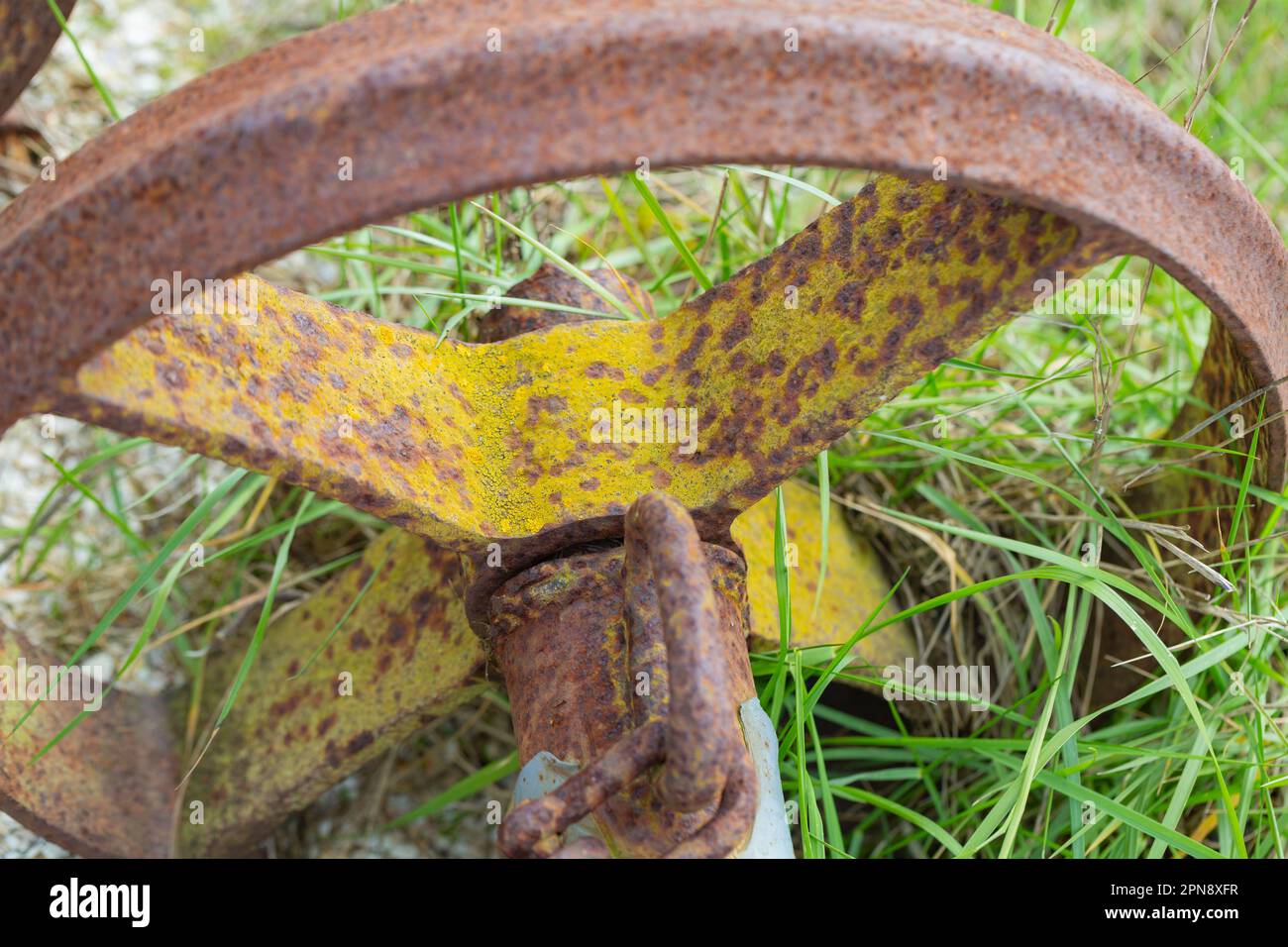 Rusty old iron wheel with corrosion detail Stock Photo - Alamy