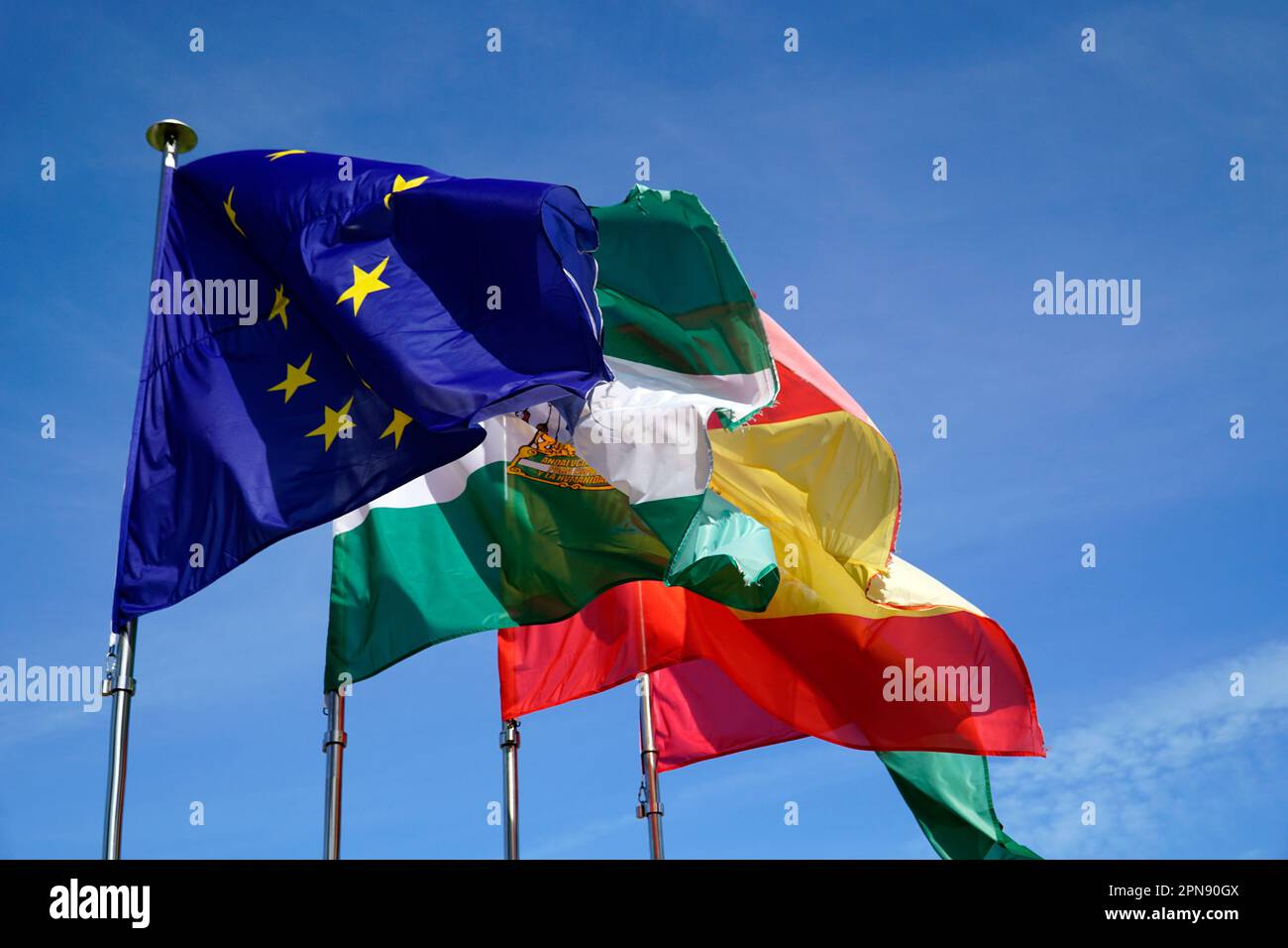 Flags of European Union, Spain, Andalusia and Granada Stock Photo - Alamy