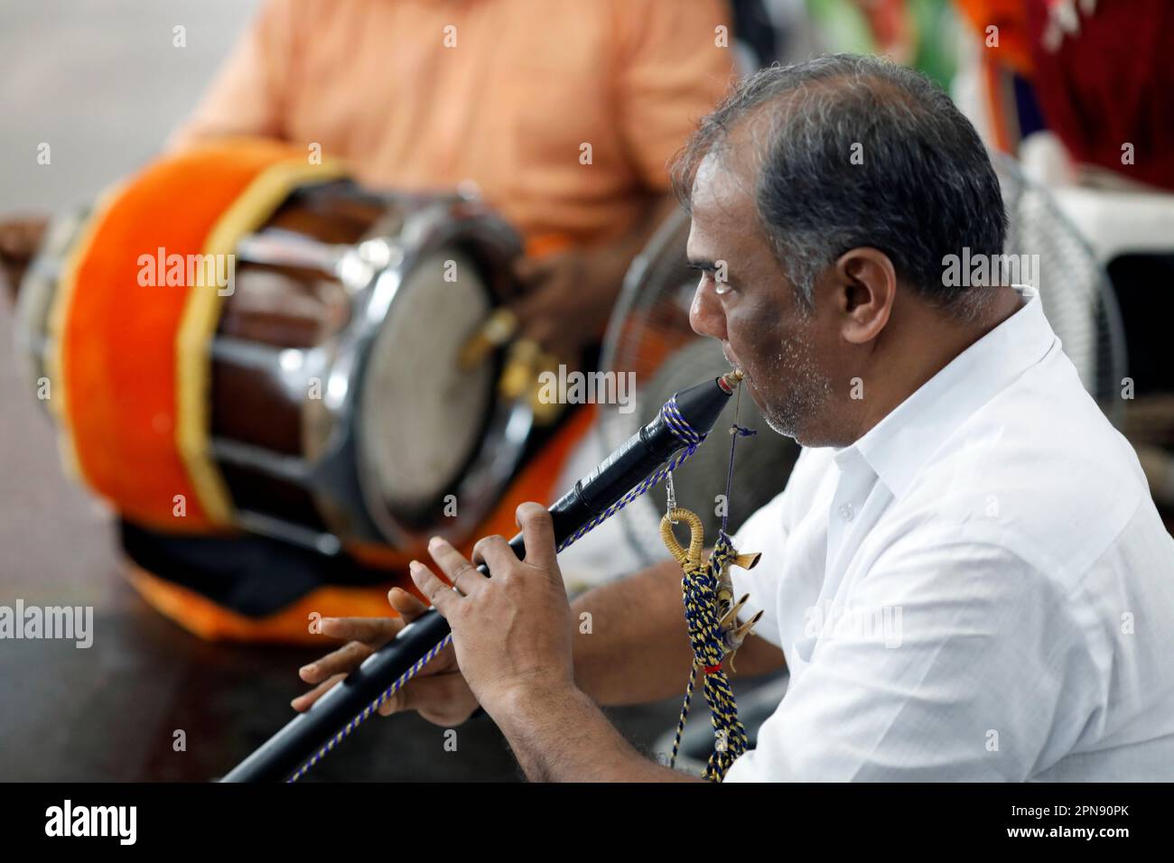 Sri Srinivasa Perumal hindu temple. Musician Playing Flute During a ...