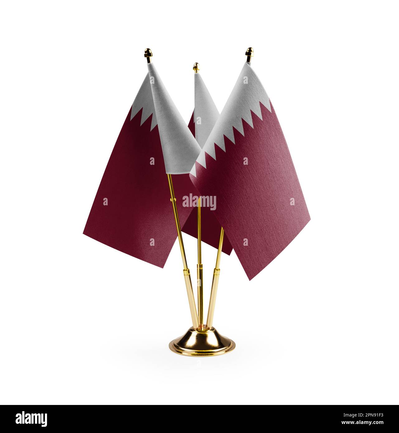 Small national flags of the Qatar on a white background Stock Photo - Alamy