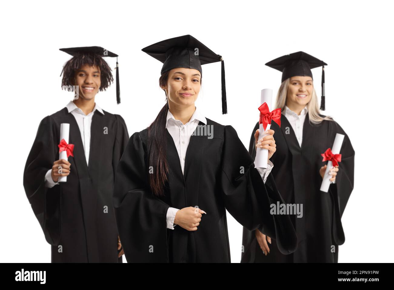 Group of happy graduate students in gowns holding diplomas isolated on ...