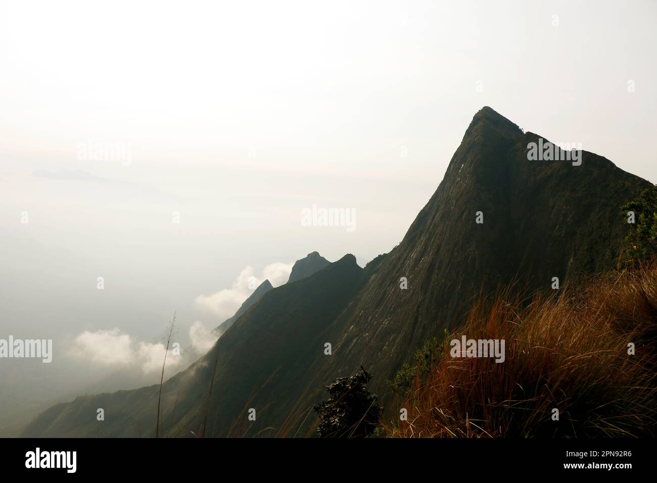 beautiful tall rock mountain top view in kerala india Stock Photo - Alamy