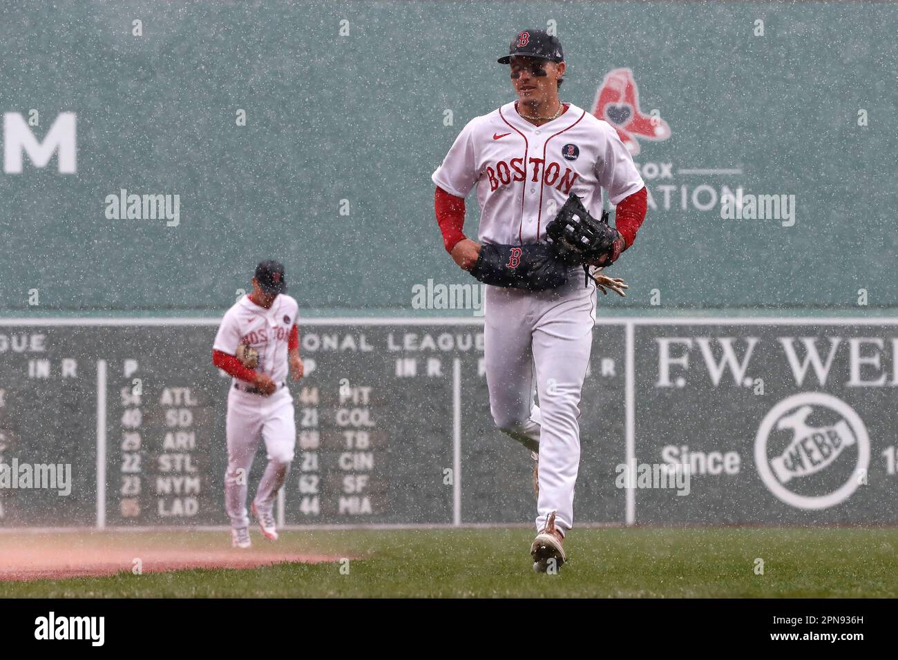 Boston Red Sox's Jarren Duran jogs in from center field during a rain ... Boston Red Sox's Jarren Duran jogs in from center field during a rain ...