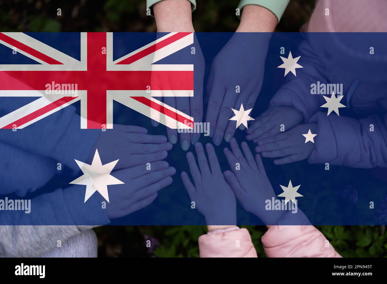 Hands of kids on background of Australia flag. Australian patriotism ...