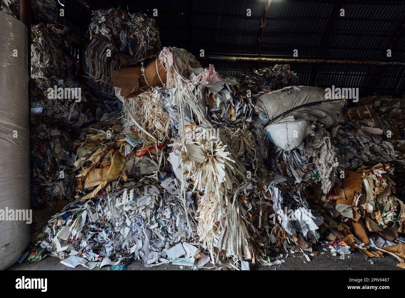Stack of waste paper at the recycling factory Stock Photo - Alamy