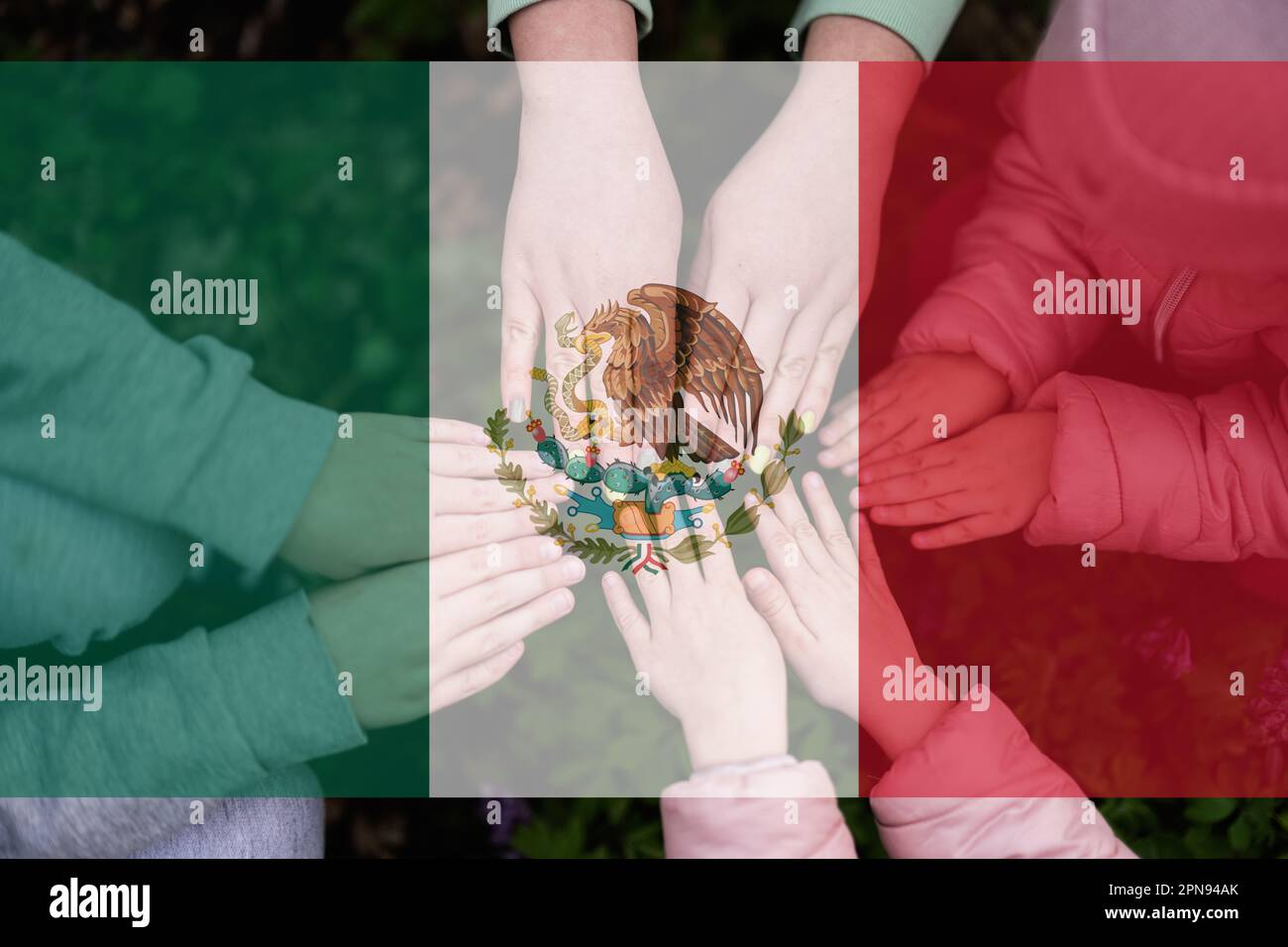 Hands of kids on background of Mexico flag. Mexican patriotism and ...