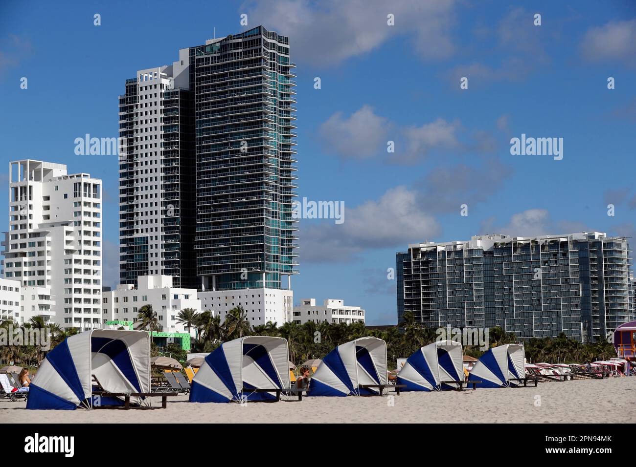Lounge Chairs lined up in the morning at a resort hotel on Miami Beach ...