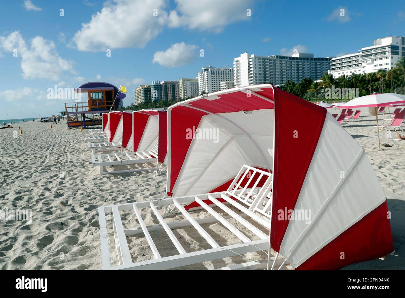 Lounge Chairs lined up in the morning at a resort hotel on Miami Beach ...