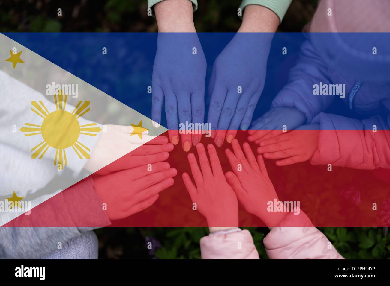 Hands of kids on background of Philippines flag. Filipino patriotism ...