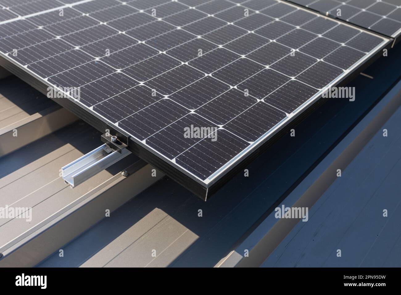 Mounted on the roof of the building solar panels for trapezoidal sheet ...