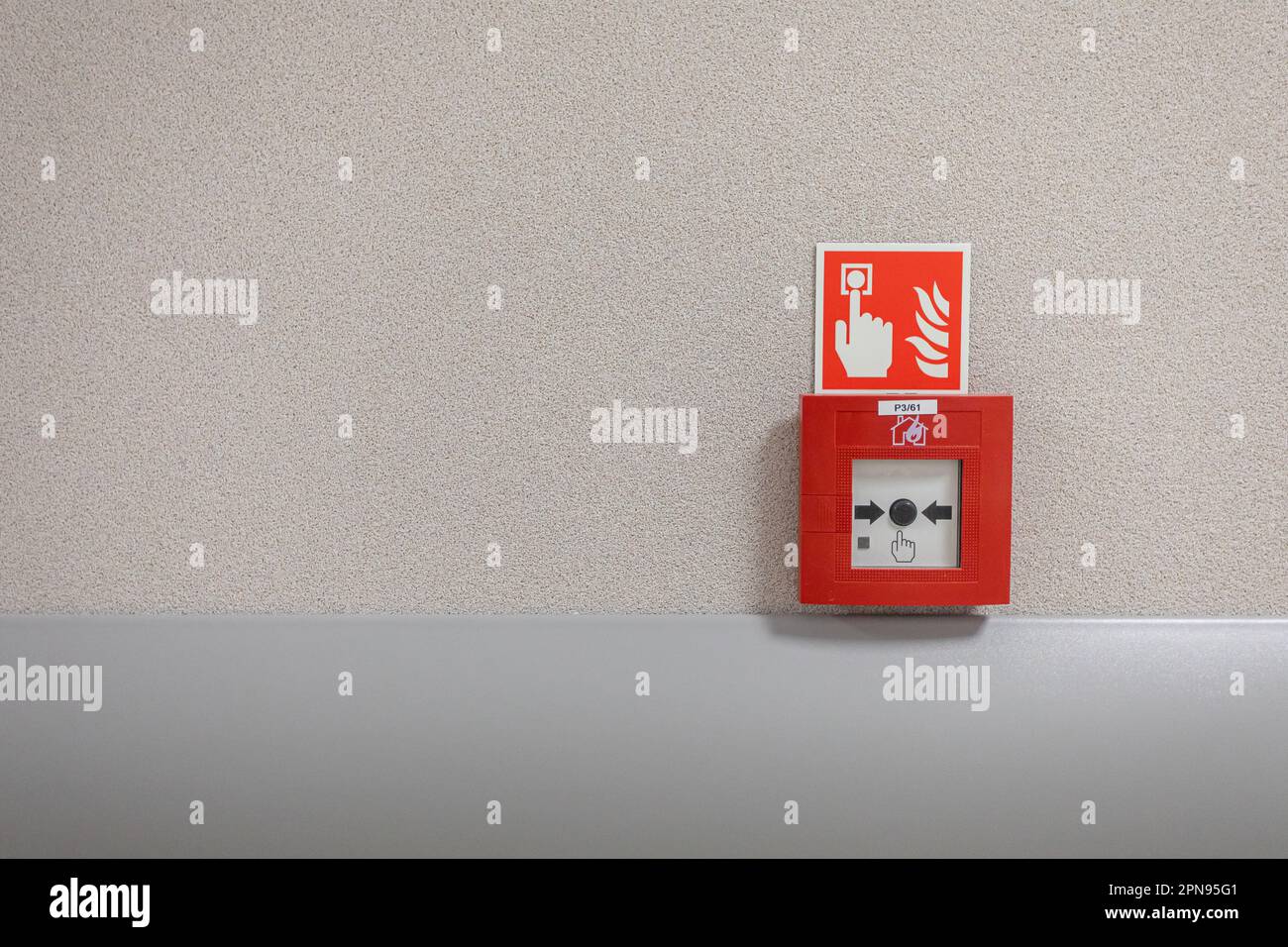 Emergency button in red box to use in case of fire Stock Photo - Alamy