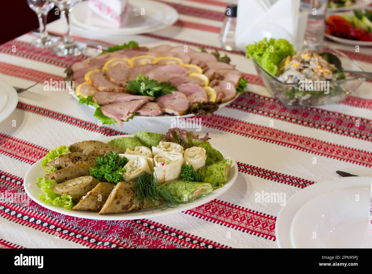 Dish rolls dish at the wedding restaurant Stock Photo - Alamy