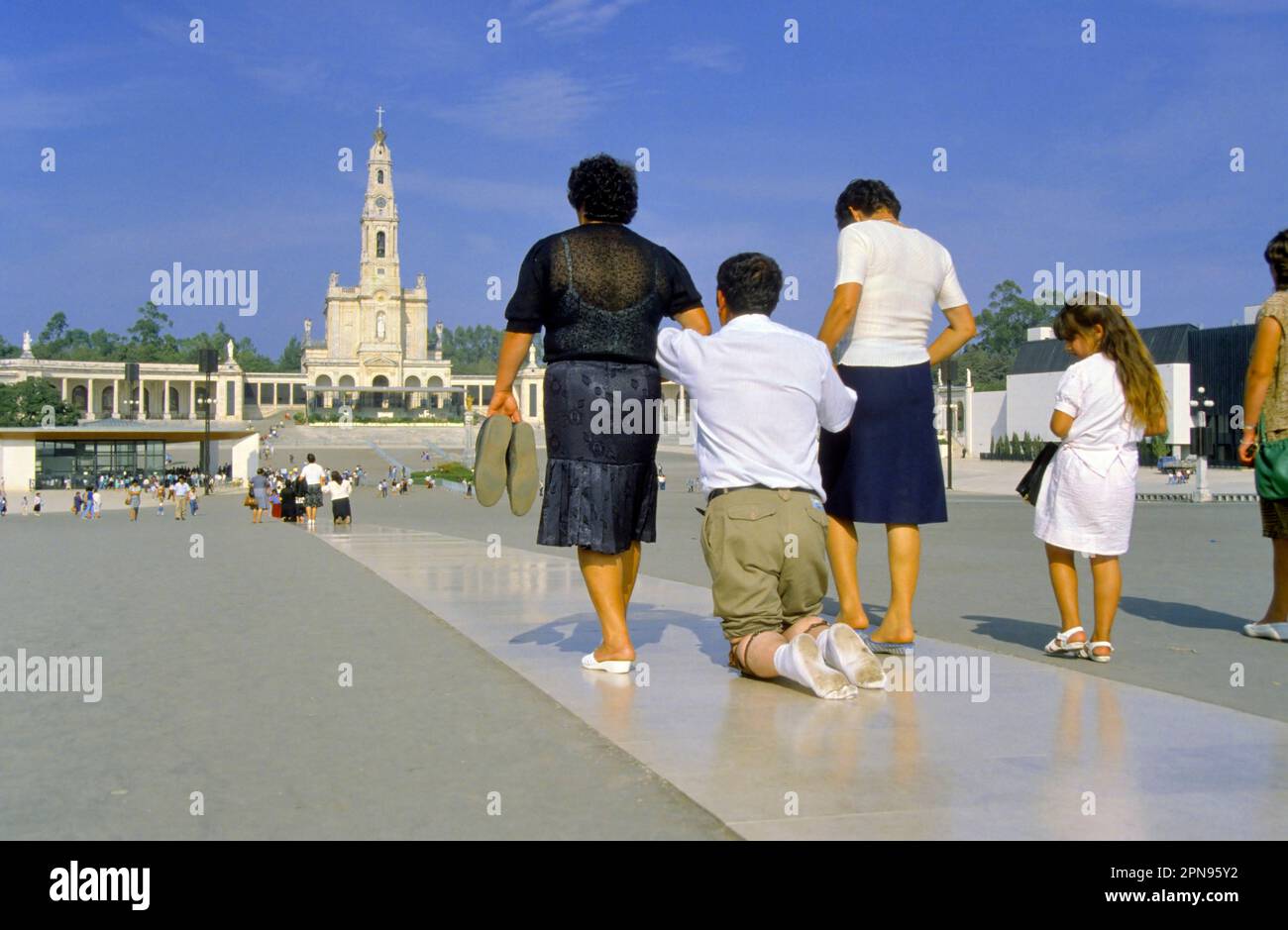 Fatima, Portugal - May 12, 2019: Shrine of Fatima. Pilgrim fulfills ...