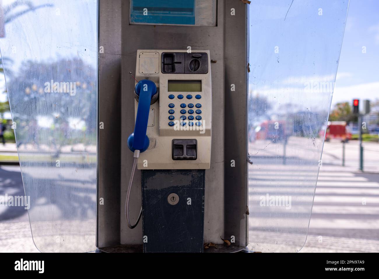 An old public telephone box located in the town of Funchal Madeira ...
