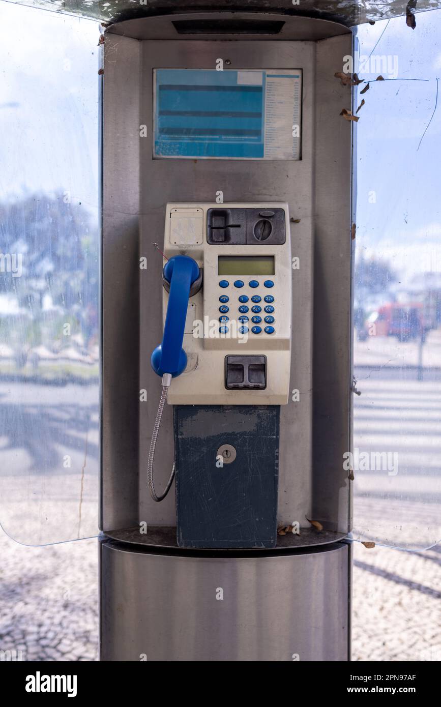 An old public telephone box located in the town of Funchal Madeira ...
