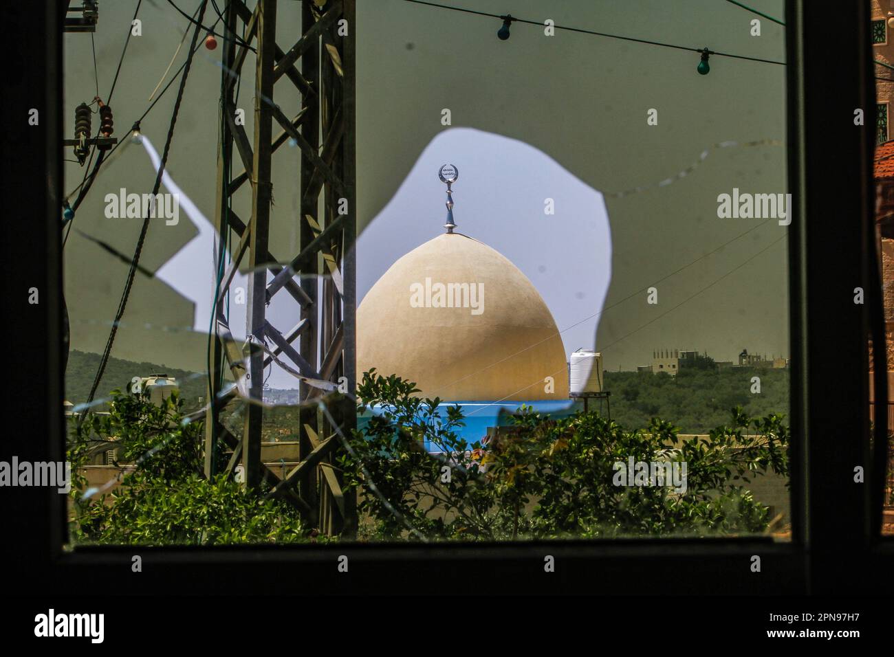 Salfit, Palestine. 17th Apr, 2023. A mosque is seen through a broken ...