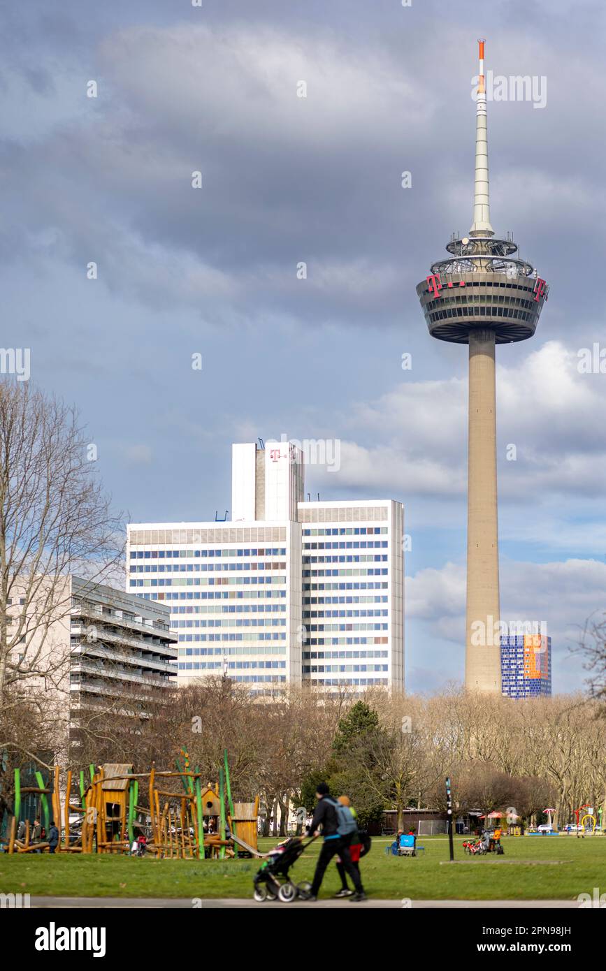 Colonius TV Tower rising high above city skyline on a bright spring day ...