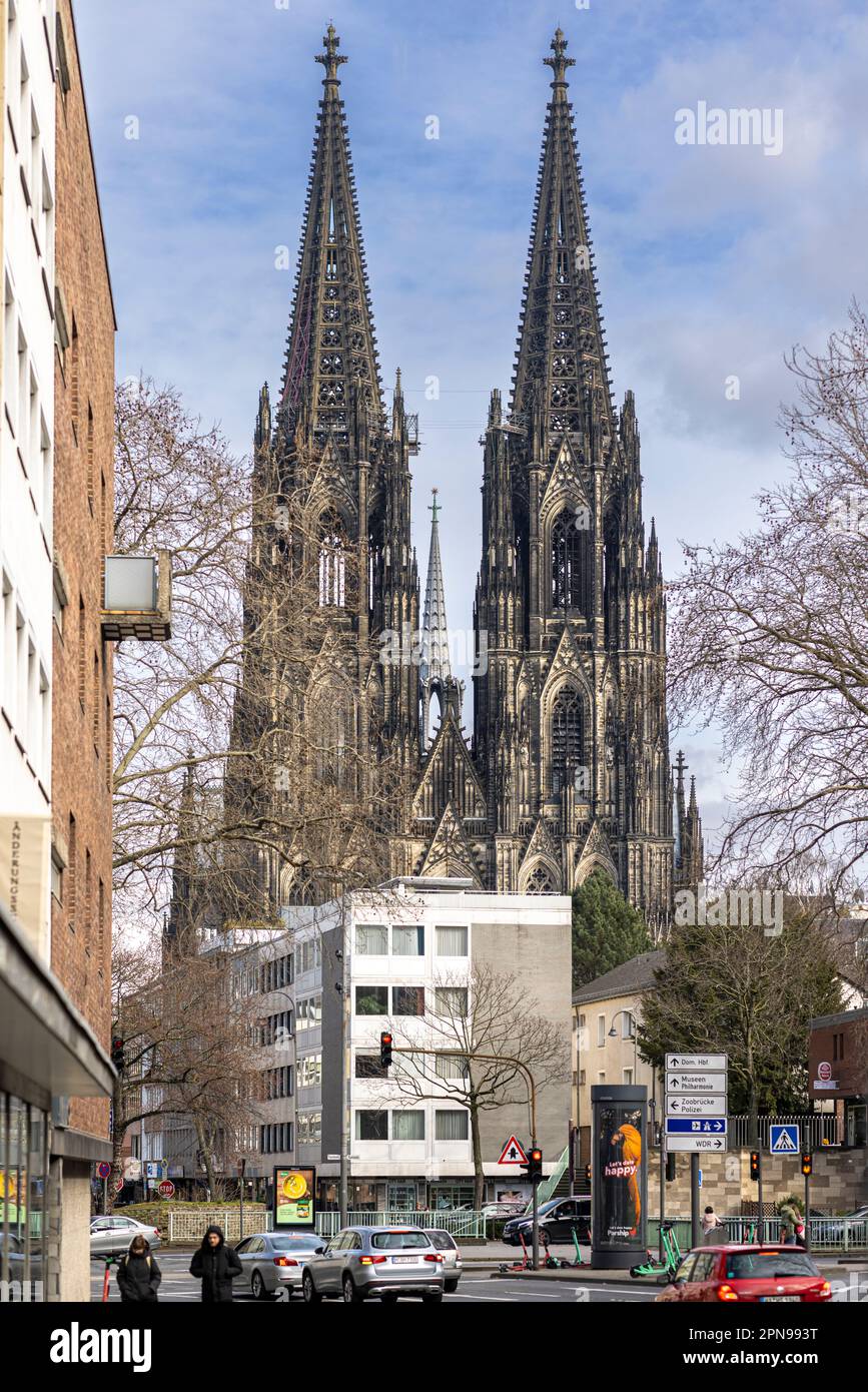 Cologne Cathedral rising above city skyline on a bright spring day ...