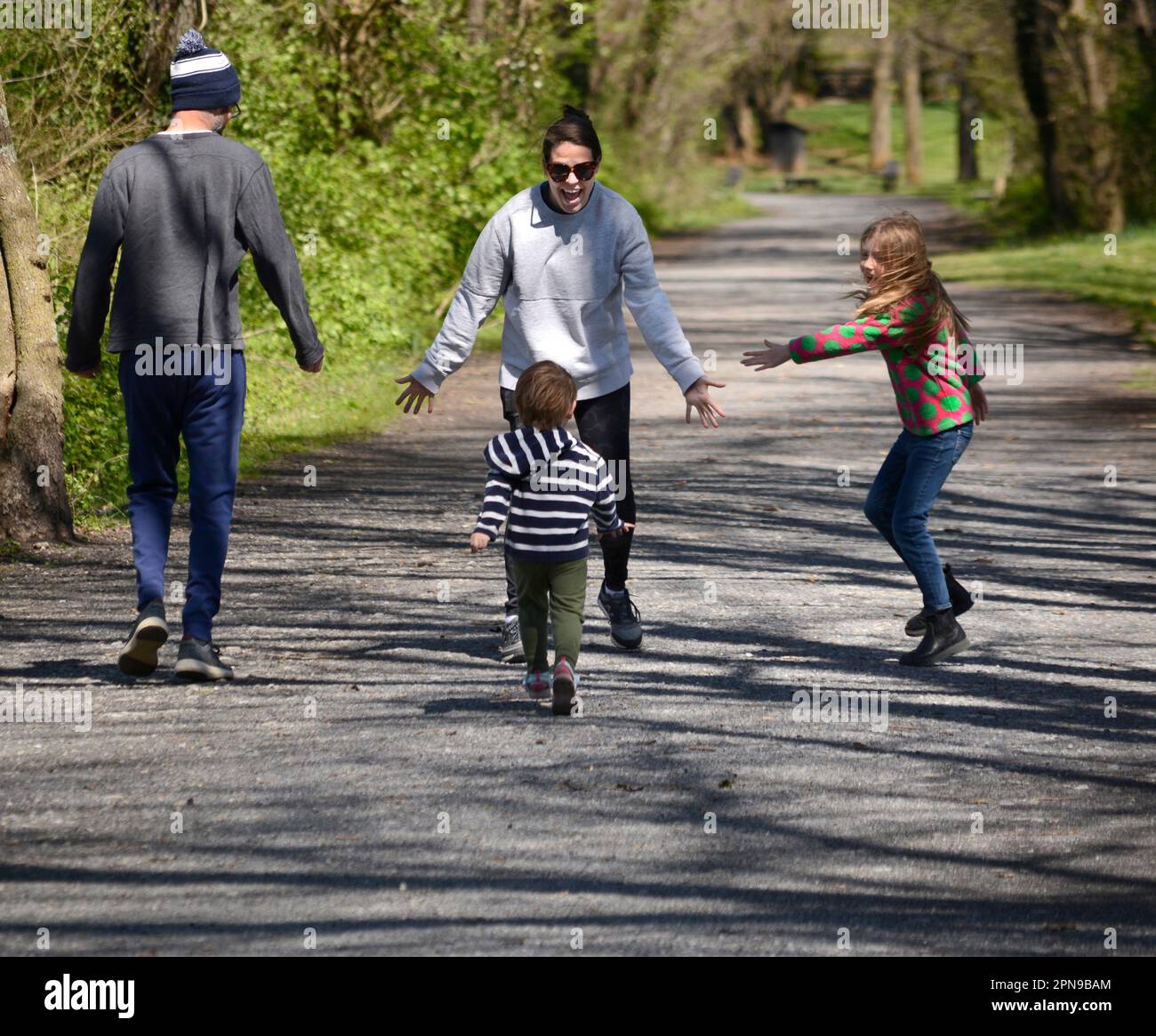 A family with children enjoy a spring walk along the popular Virginia ...