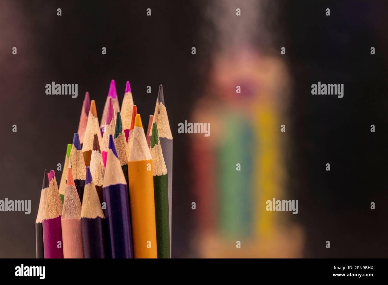 Dynamic close up still life of art coloured pencils grouped together in ...
