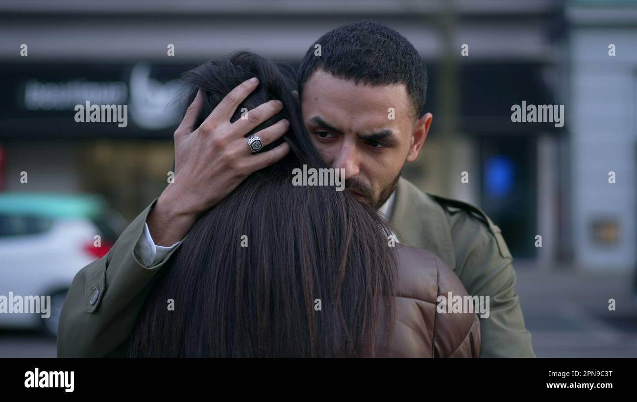 Couple embrace in empathy calming partner during difficult times. A ...