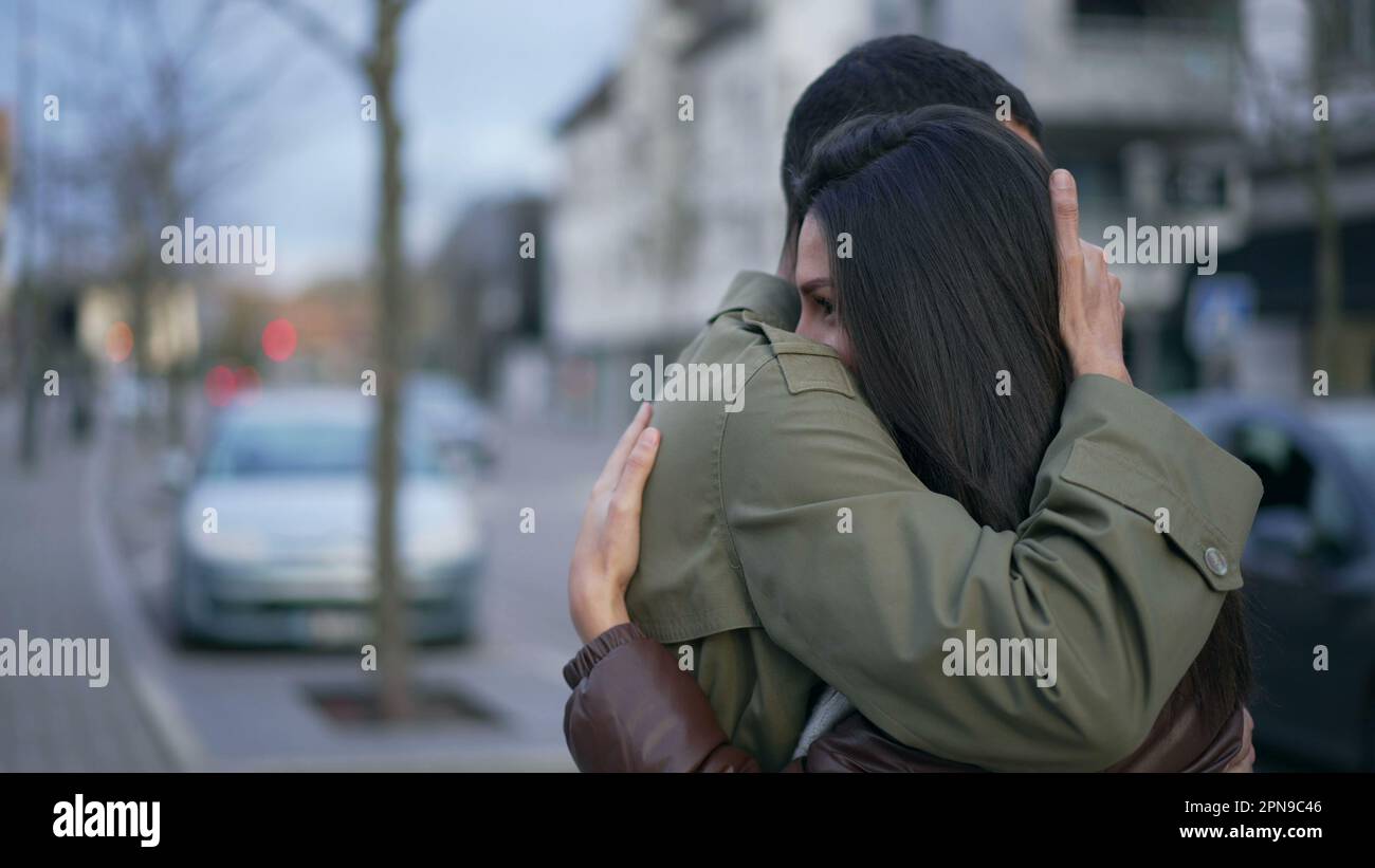 Couple embrace consolation hi-res stock photography and images - Alamy