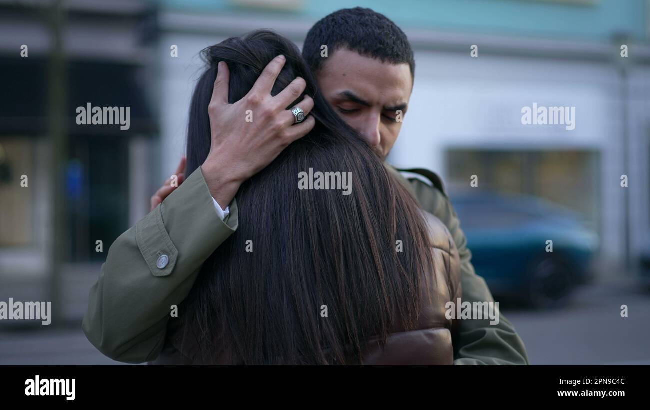 Couple embrace in empathy calming partner during difficult times. A ...