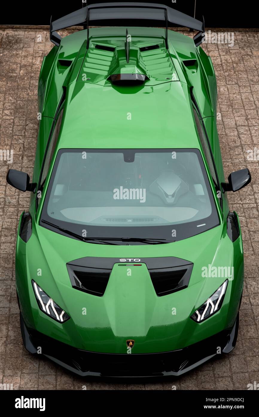 A vertical shot of a beautiful sleek luxurious Lamborghini Huracan Sto ...